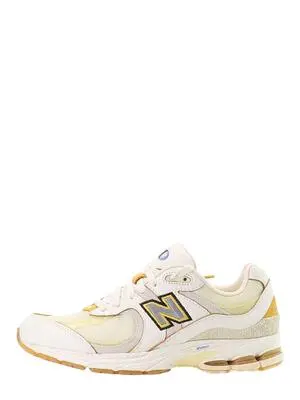 NEW BALANCE New Balance X Joe Freshgoods 2002R "Conversations Amongst Us" Cream/orange
