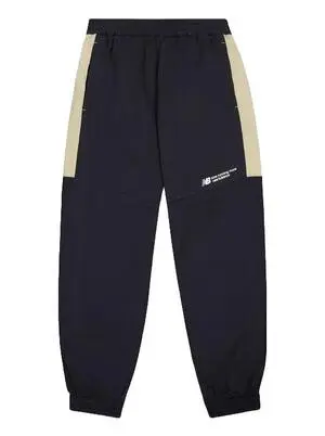 NEW BALANCE Woven Track Pants Asia Sizing - Black