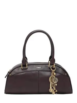 Chloé Plum Leather Bowling Bag With Gold Tone Charms - Red