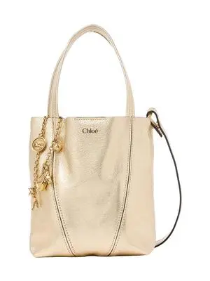 Chloé Chloé Small Spin Tote Bag In Metallized Leather With Horse Charms Light Gold