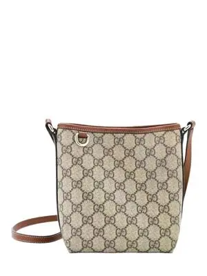 Gucci Gg Emblem Gg Coated Canvas Nano Bucket Bag - Brown