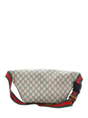 Gucci Gg Coated Canvas Belt Bag With Applique - Brown