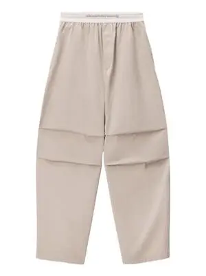 Alexander Wang Logo-elastic Pleated Knee Trousers - Stone