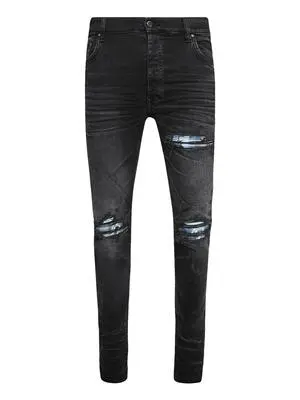 AMIRI Amiri MX1 Faded Black Jeans With Distressed Detailing