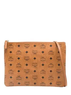 Mcm Logo Patterned Zipped Clutch Bag - Brown