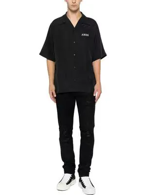 Amiri Coated Distressed Effect Jeans - Black