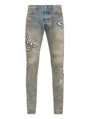 Amiri Skinny Jeans With Domino Motif - Blue
