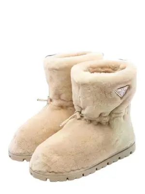 Prada Shearling Logo Plate Boots - Neutrals