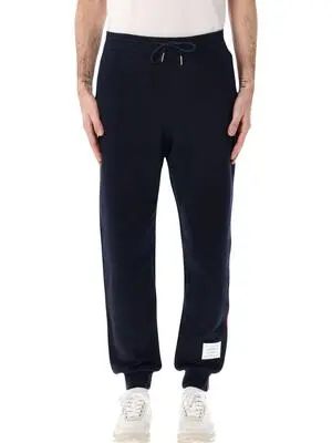 THOM BROWNE Thom Browne Grosgrain-Trim Drawstring Sweatpants With Tricolor Side Stripe And Ankle Logo Patch