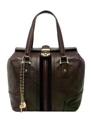 Gucci Embossed Leather Handbag - Brown