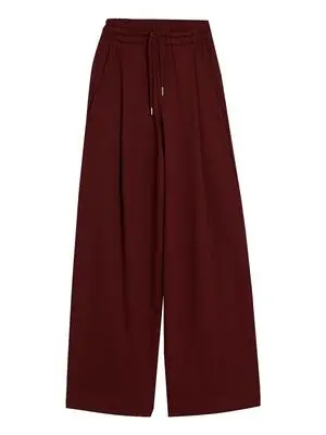 Dries Van Noten Pleated Cotton-terry Track Pants - Claret