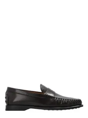 TOD'S Round Toe Penny Loafers With Embossed Monogram - Black
