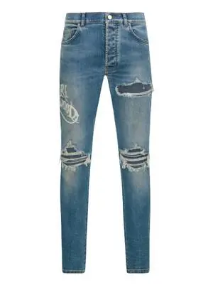 Amiri Ripped Jeans With Hollywood Logo - Blue