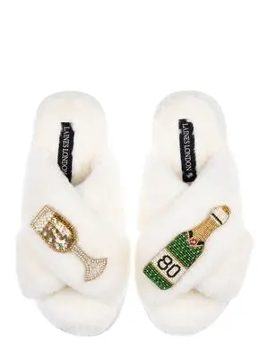 LAINES LONDON Faux Fur Cross Strap Slippers With Champagne And 80th Birthday Brooches - White
