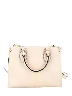 LOUIS VUITTON Onthego Pm Monogram Empreinte Giant Shoulder Bag - Neutrals
