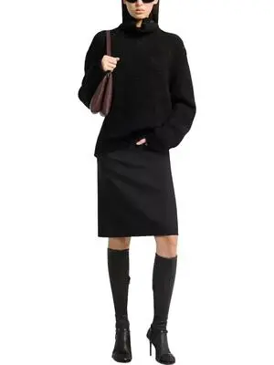 COURREGES Bouclé-knit Turtleneck Sweater - Black