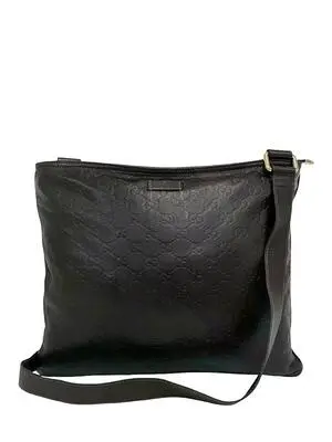 Gucci Embossed Monogram Crossbody Bag - Brown
