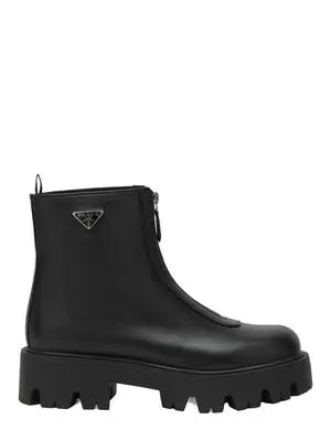 Prada Calfskin Zip-up Ankle Boots With Lug Sole - Black