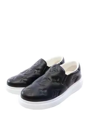 LOUIS VUITTON Monogram-embossed Slip-on Sneakers - Black