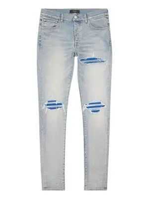 Amiri Ripped Ultrasuede Skinny Jeans - Blue