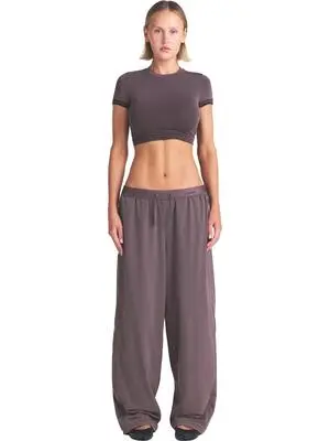 SKIMS Oversized Stretch Nylon Pants - Resin