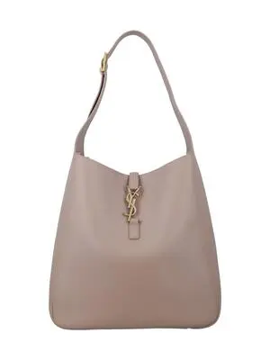 Saint Laurent Saint Laurent Le 5 À 7 Supple Large Calfskin Handbag With CASSANDRE Hook Closure And Adjustable Strap Light Cumin