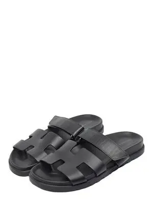 Hermès Chypre Leather Flat Sandals - Black