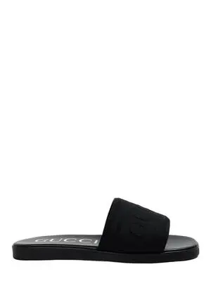 Gucci Flat Slip-on Sandals With Embossed Logo - Black
