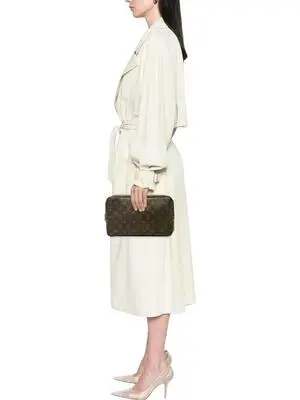 LOUIS VUITTON Monogram Canvas Trousse Toilette 28 Clutch - Brown