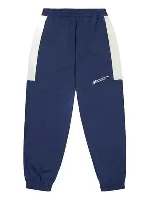 NEW BALANCE Woven Track Pants Asia Sizing - Navy