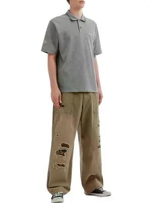 AFTERMATHS Paint-splatter Distressed-effect Jeans - Neutrals