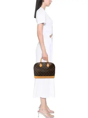LOUIS VUITTON 2004 Monogram Alma Pm Handbag - Brown