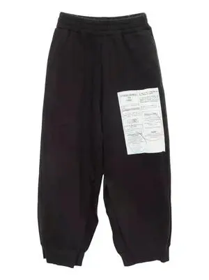 MAISON MARGIELA Newspaper Print Track Pants - Black