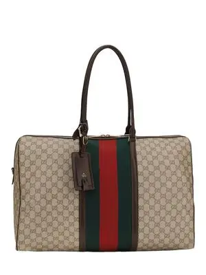 Gucci Gg Monogram Fabric Travel Bag With Leather Handles - Brown
