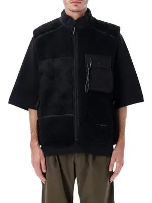 AND WANDER Technical Wool-blend Gilet With High Neck And Zip Pockets - Black