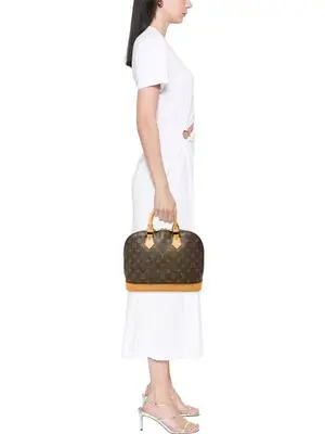 LOUIS VUITTON Monogram Alma Pm Handbag - Brown