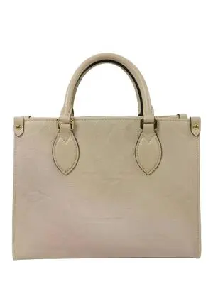 LOUIS VUITTON On The Go Monogram Empreinte Tote Bag - Neutrals