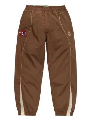 DENIM TEARS Diaspora Track Pant - Brown