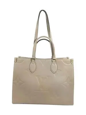 LOUIS VUITTON On The Go Mm Monogram Empreinte Tote Bag - Neutrals