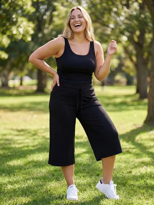 24SEVEN COMFORT APPAREL Curvy Basic Ribbed Knit Drawstring Flared Capri Pants - Mocha