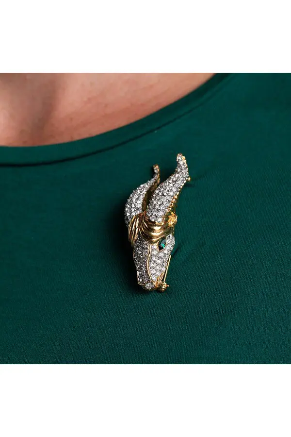 KENNETH JAY LANE Rhinestone And Emerald Capricorn Pin - Natural
