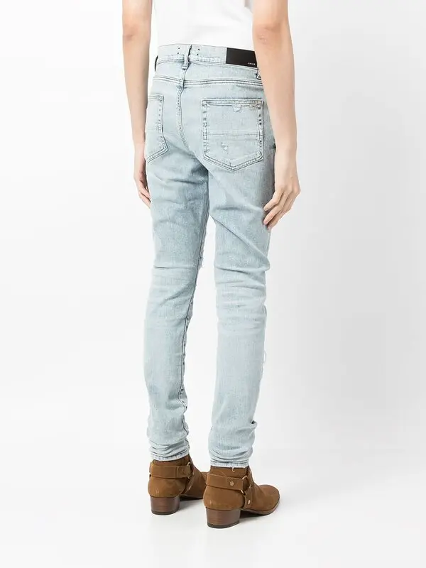 Amiri Distressed Skinny Jeans