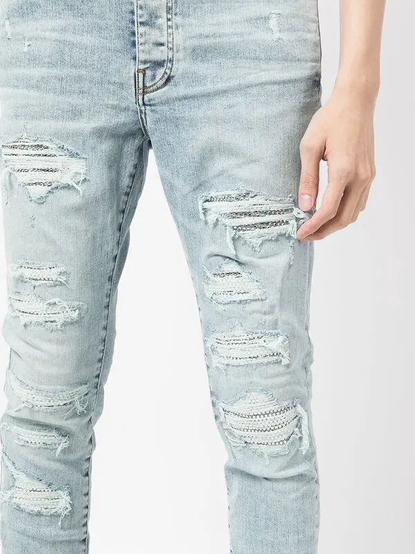 Amiri Distressed Skinny Jeans