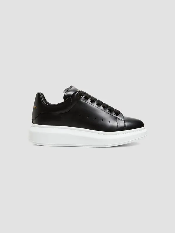 Alexander McQueen S Oversized Embossed Logo Leather Sneakers - Black
