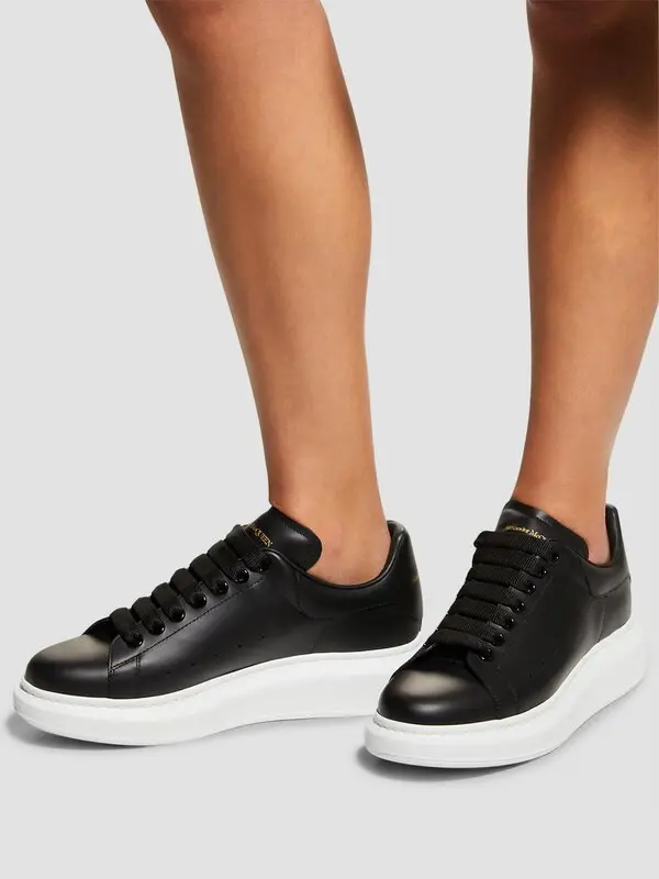 Alexander McQueen S Oversized Embossed Logo Leather Sneakers - Black