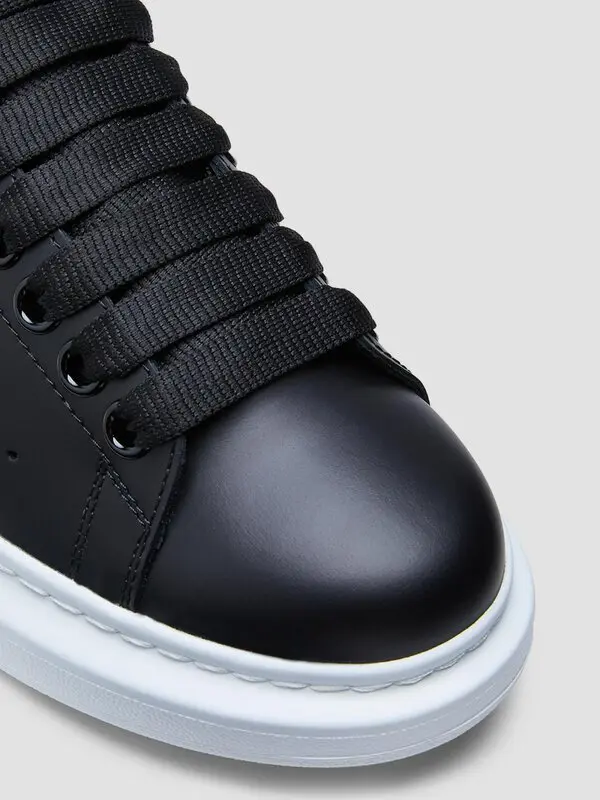 Alexander McQueen S Oversized Embossed Logo Leather Sneakers - Black