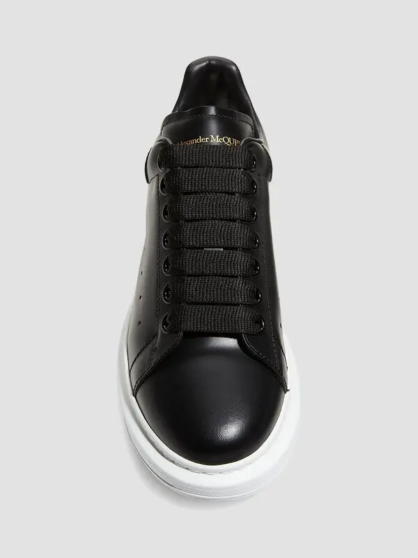 Alexander McQueen S Oversized Embossed Logo Leather Sneakers - Black