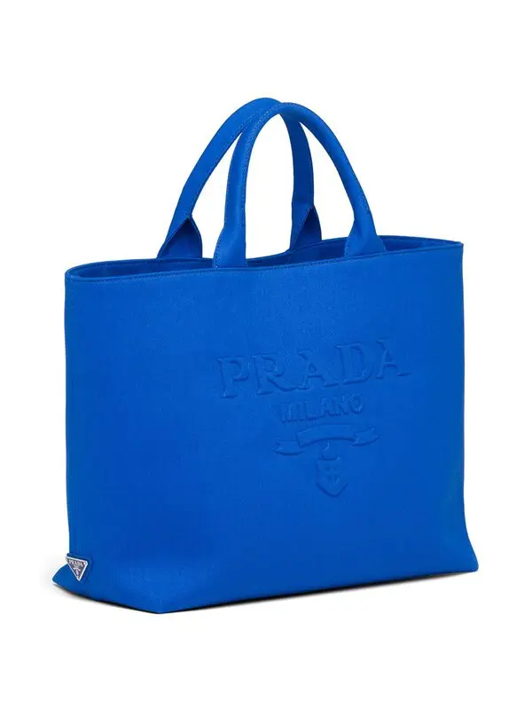 Prada Logo-Embossed Drill Tote Bag - Blue | Editorialist
