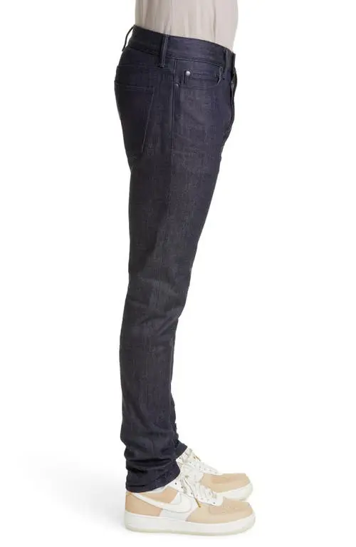 John Elliott The Cast 2 Slim-fit Jeans - Raw Indigo