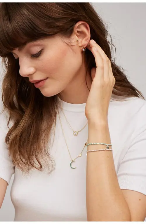 Estée Lauder Engraved Pendant Necklace